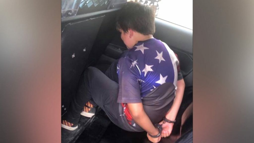 handcuffed-autistic-boy-Abraham-Hibbert-1200x675 - Viral Tales